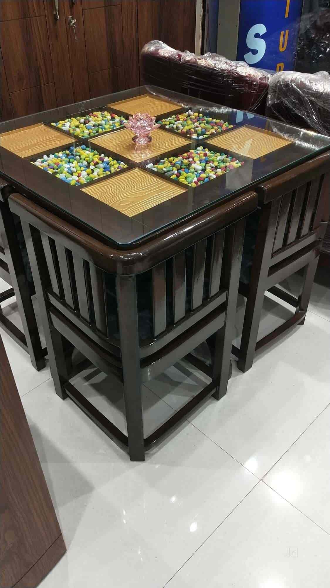 Dining table with glass top and pebbles store